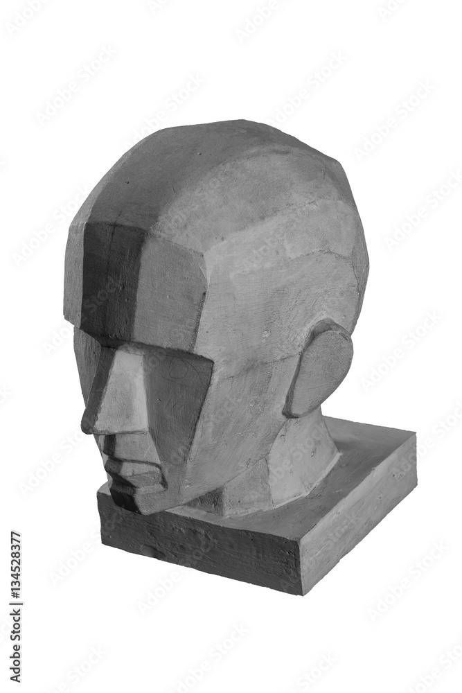 plaster statue of a human skull and head with an angular outline ...