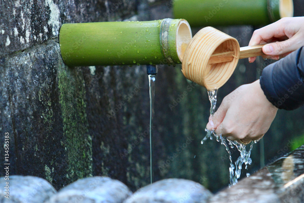 Washing Hands Before Entering Temple Stock Photo | Adobe Stock