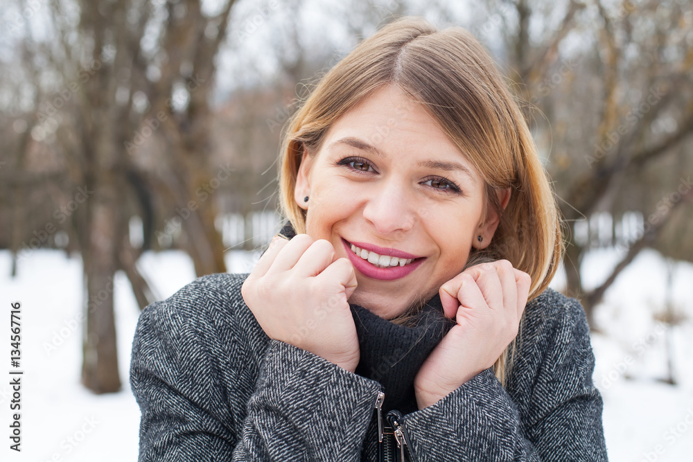 Young woman feeling cold Stock Photo | Adobe Stock