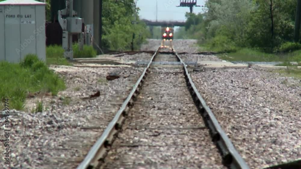 Heat Waves Rise from Tracks as Train Approaches Stock Video | Adobe Stock