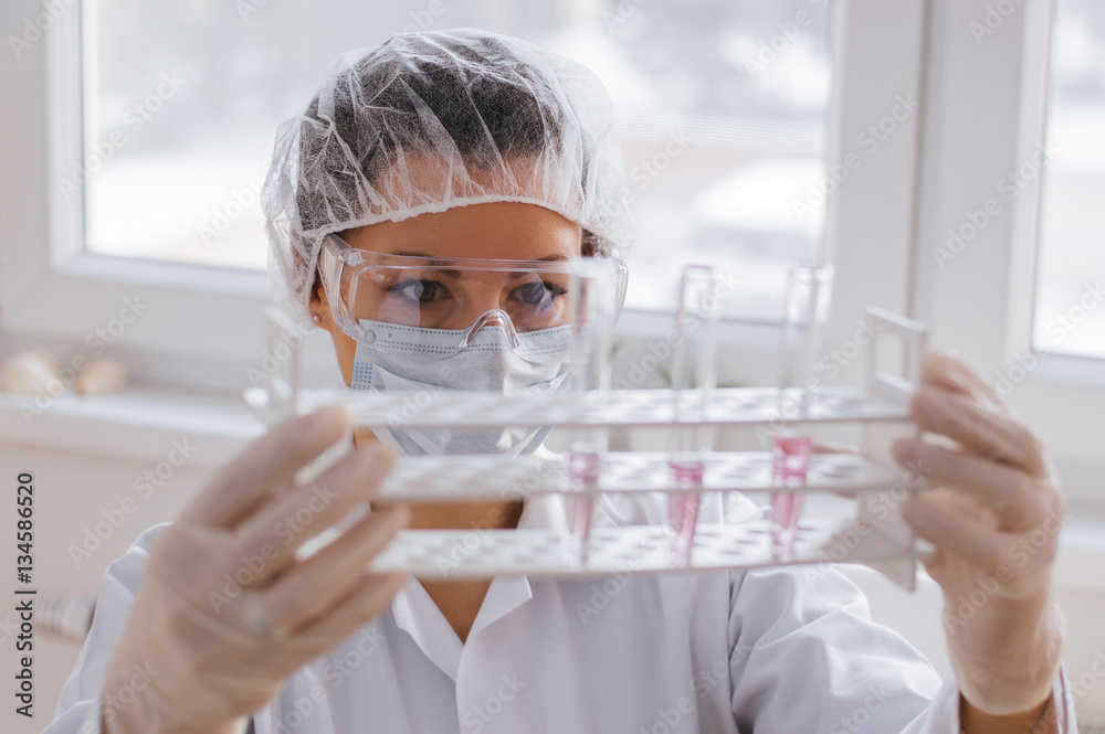 Young scientists with test tube making research in clinical labo Stock ...