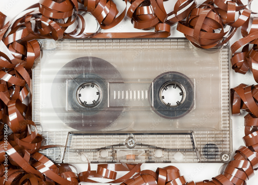 Vintage transparent Compact Cassette with pulled out tape audio ...