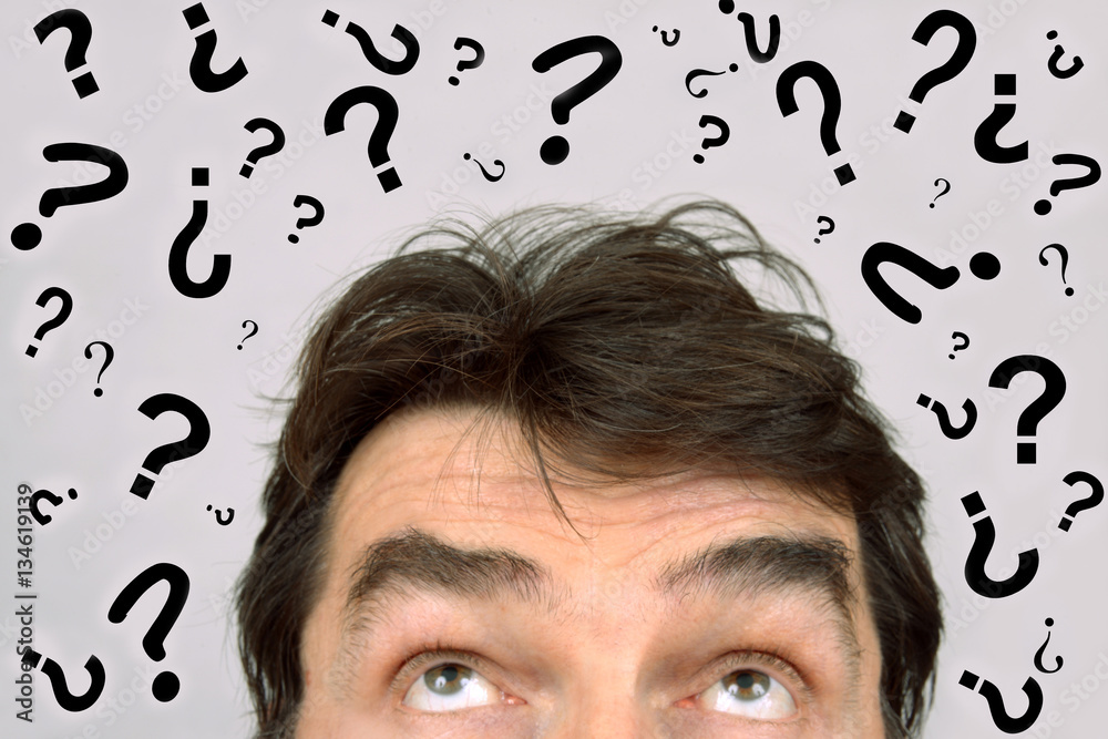 Homme qui se pose des questions Photos | Adobe Stock