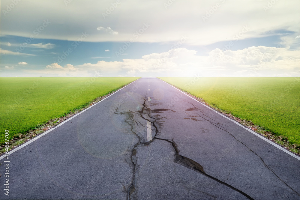 Cracked surface of an asphalt road,Highways road with blue skies Stock ...