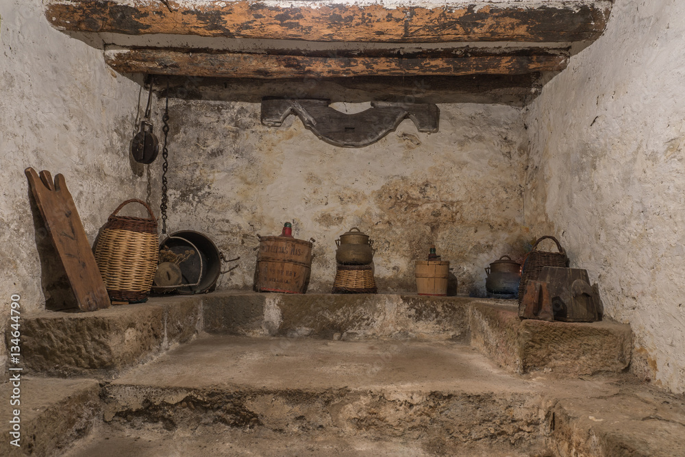 Basement of an old house with wooden beams and wall with humidity ...