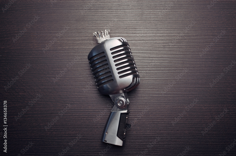 Retro microphone in crown for best singers Stock Photo | Adobe Stock