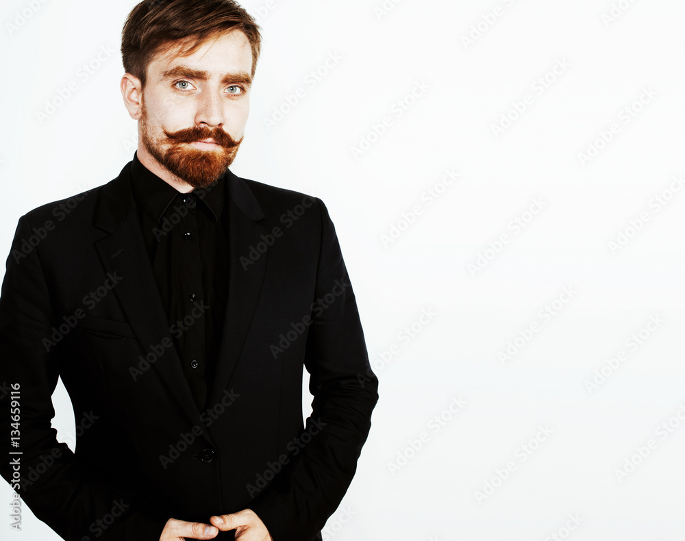 young red hair man with beard and mustache in black suit on whit Stock ...