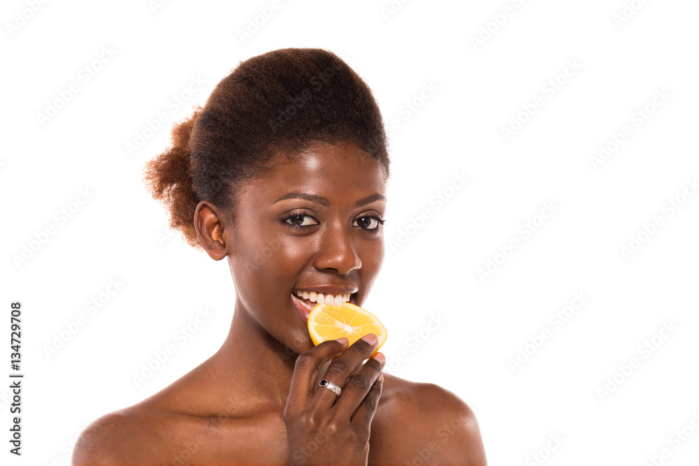 afro american woman posing with slices of lemon Stock Photo | Adobe Stock