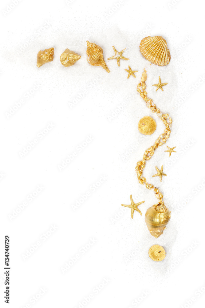 Border of painted golden shells on white sand Stock Photo | Adobe Stock