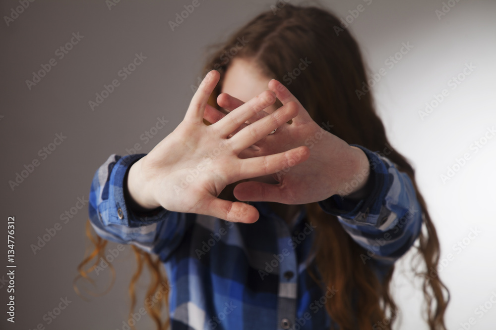 Girl showing stop hand sign gesture (Body language, gestures, ps Stock ...