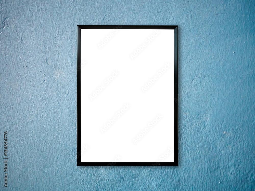 poster frame on blue paint wall background Stock Photo | Adobe Stock