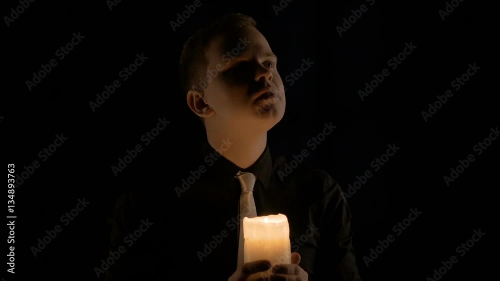 Love handsome young man holding a candle. Romantic date. Stock Video ...