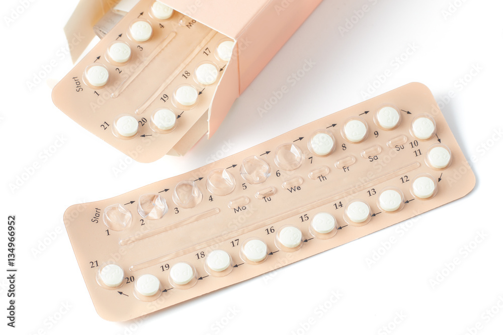 Colorful oral contraceptive pill strips isolated on white background ...