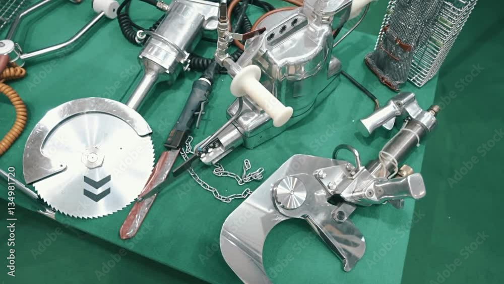 Shiny and powerful hand-held industrial devices for butchering animals ...