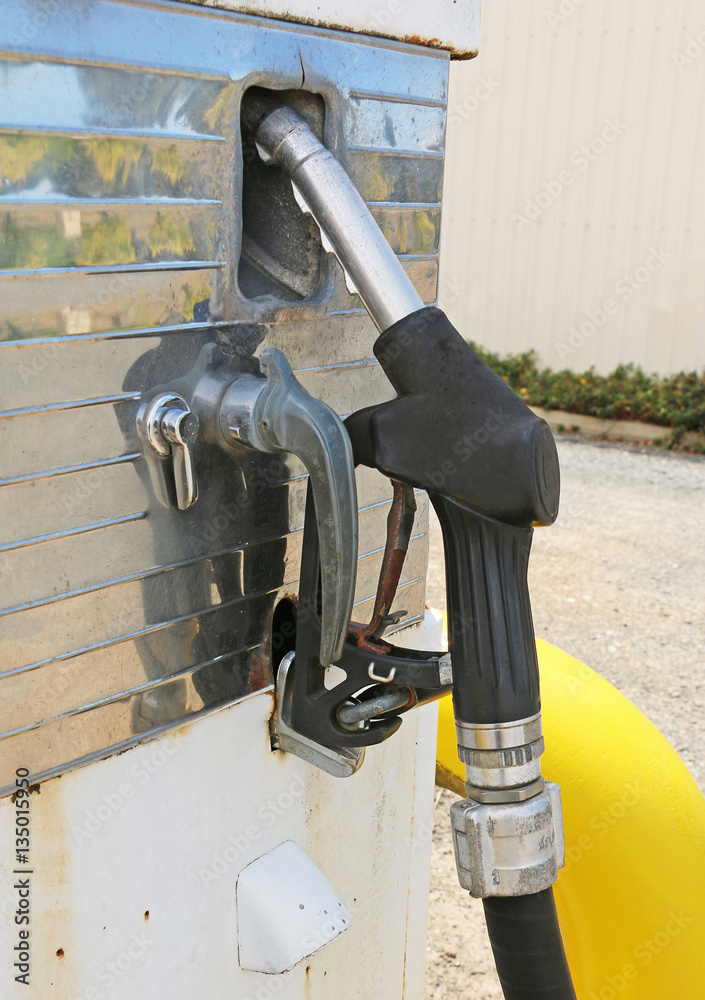 nozzle and hose on a fuel bowser Stock Photo | Adobe Stock
