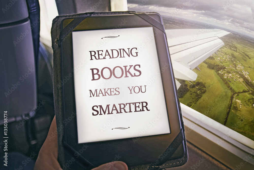 Human reading book inside airplane. Concept art Stock Photo | Adobe Stock
