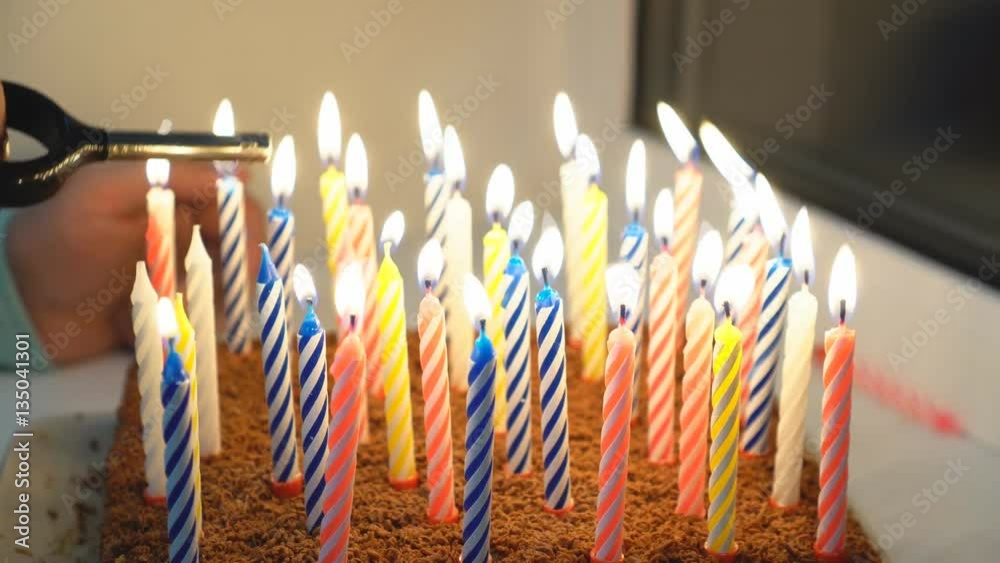 Birthday cake with many candles Stock Video | Adobe Stock