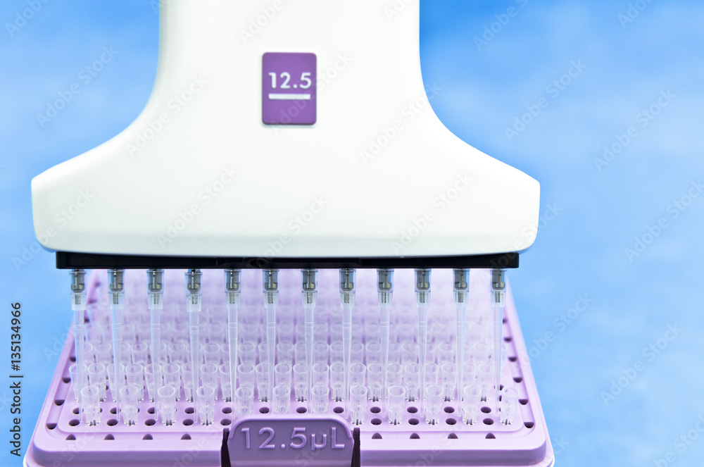 Electronic multichannel pipette and micro tips for experiments Stock ...
