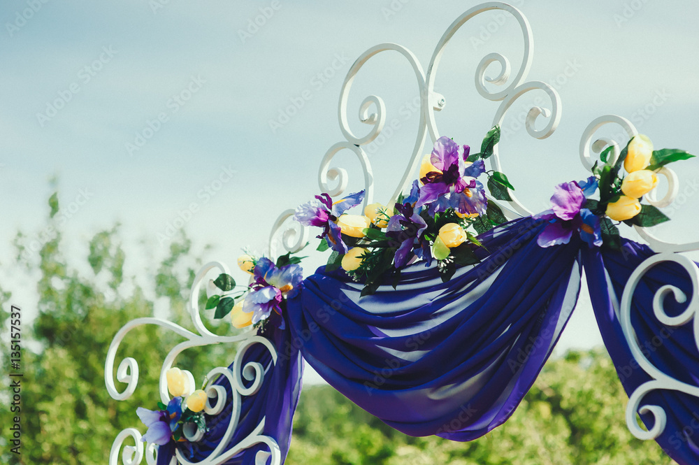 Wedding arch with fabrics and colors purple Stock Photo | Adobe Stock