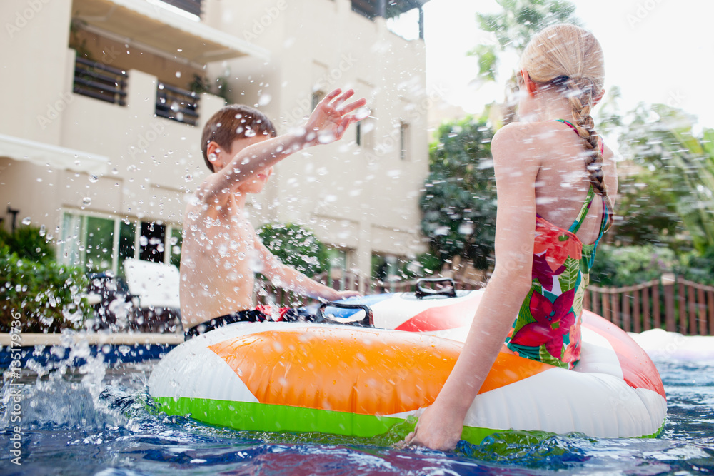 Children playing in swimming pool. Stock Photo | Adobe Stock