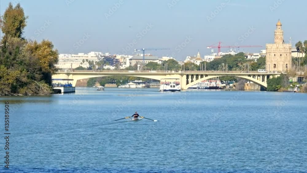 A single man rowing boat in the centre of Seville, Spain Stock-Video ...