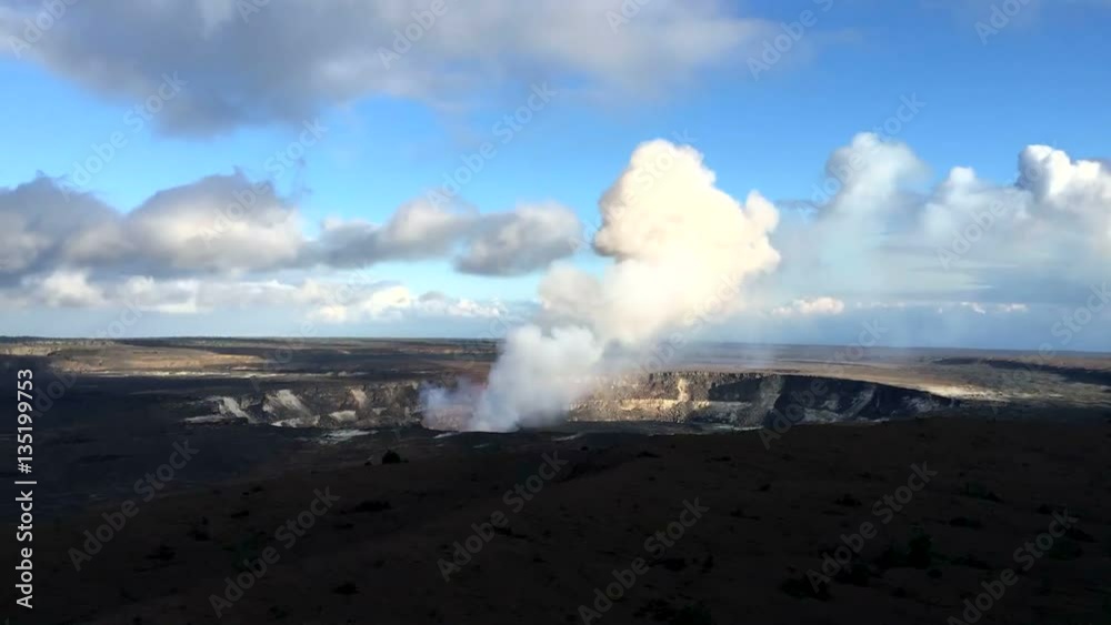 Time lapse of Kilauea volcano showing smoke and steam rising from an ...