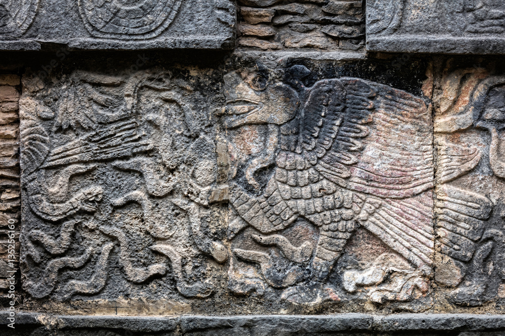 Ancient Mayan mural depicting an eagle grasping a human heart on the ...