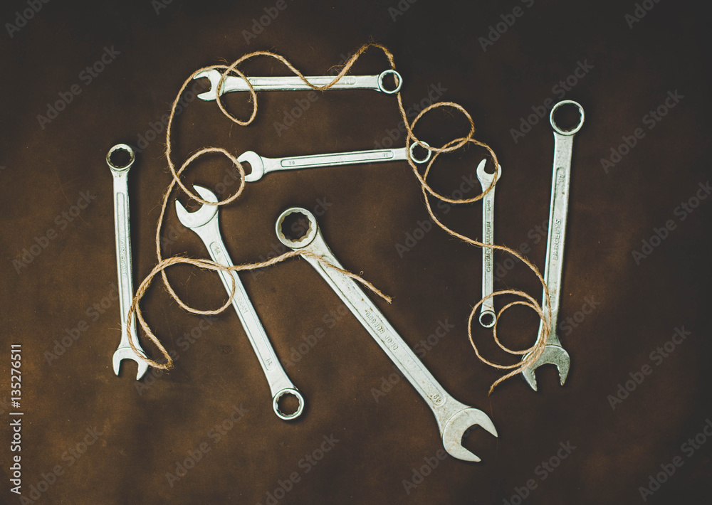Wrenches on a brown background Stock-Foto | Adobe Stock