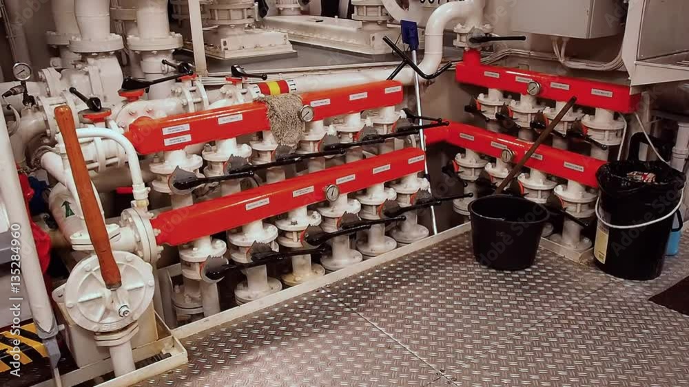 Ships valves, main engine - engineering interior. Valves in Vessel's ...