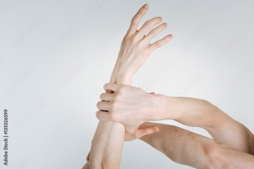 Strong athletes hands demonstrating power in the studio foto de Stock ...