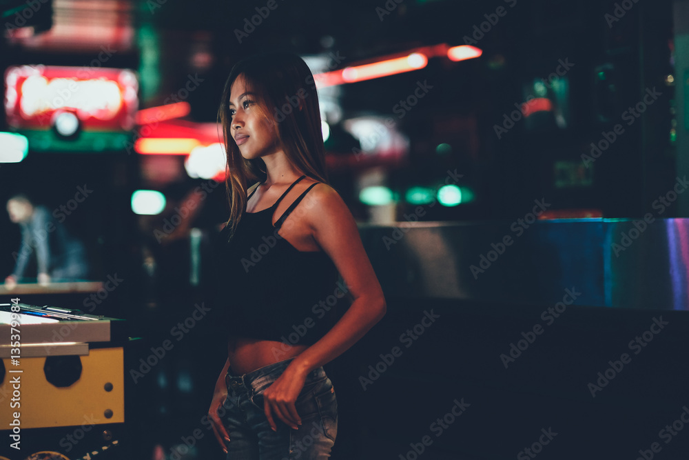 Sexy girl standing in the night club Stock Photo | Adobe Stock