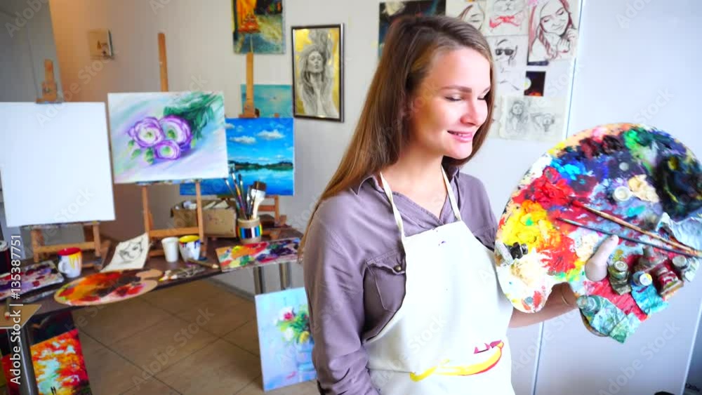 Women Beautiful Painter Posing and Smiling Into Camera With Brushes and ...