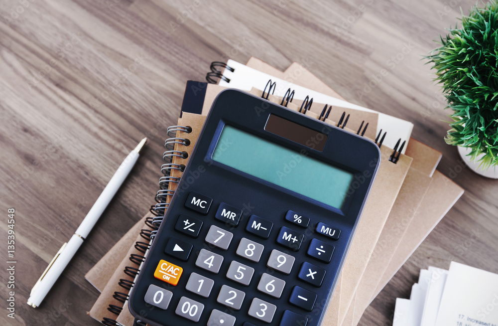 Calculator on office desk background Stock Photo | Adobe Stock