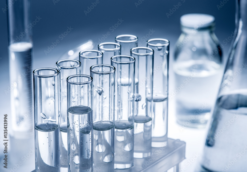 Different laboratory beakers and glassware. Stock Photo | Adobe Stock