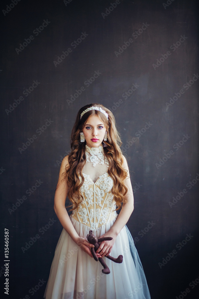 Fashion photo of sad girl wearing wedding dress Stock Photo | Adobe Stock