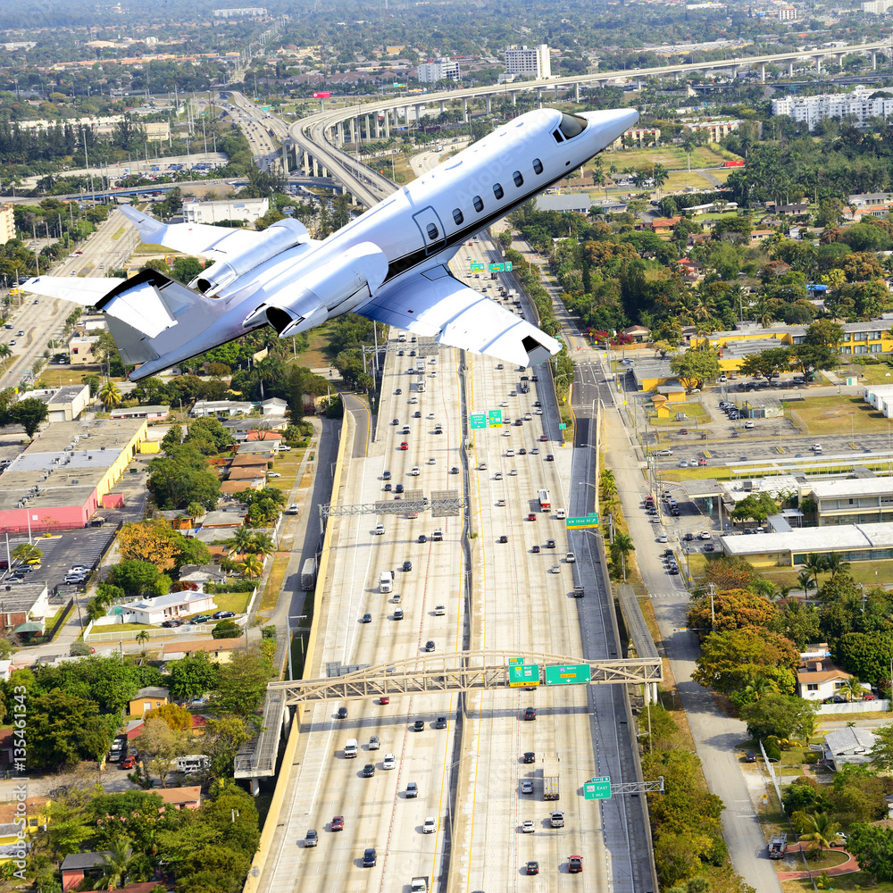 Airplane Flying over Miami, Florida Stock Photo | Adobe Stock