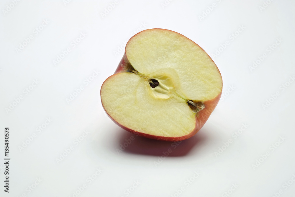 Half of red apple isolated on white background. Stock Photo | Adobe Stock