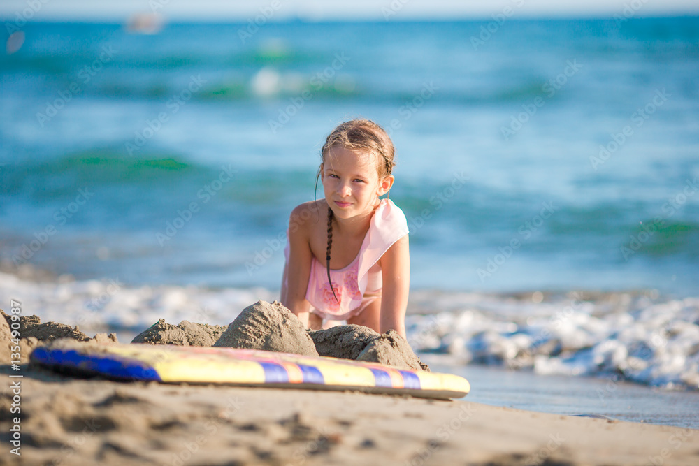 Adorable little girl at beach during summer vacation in Europe Stock ...