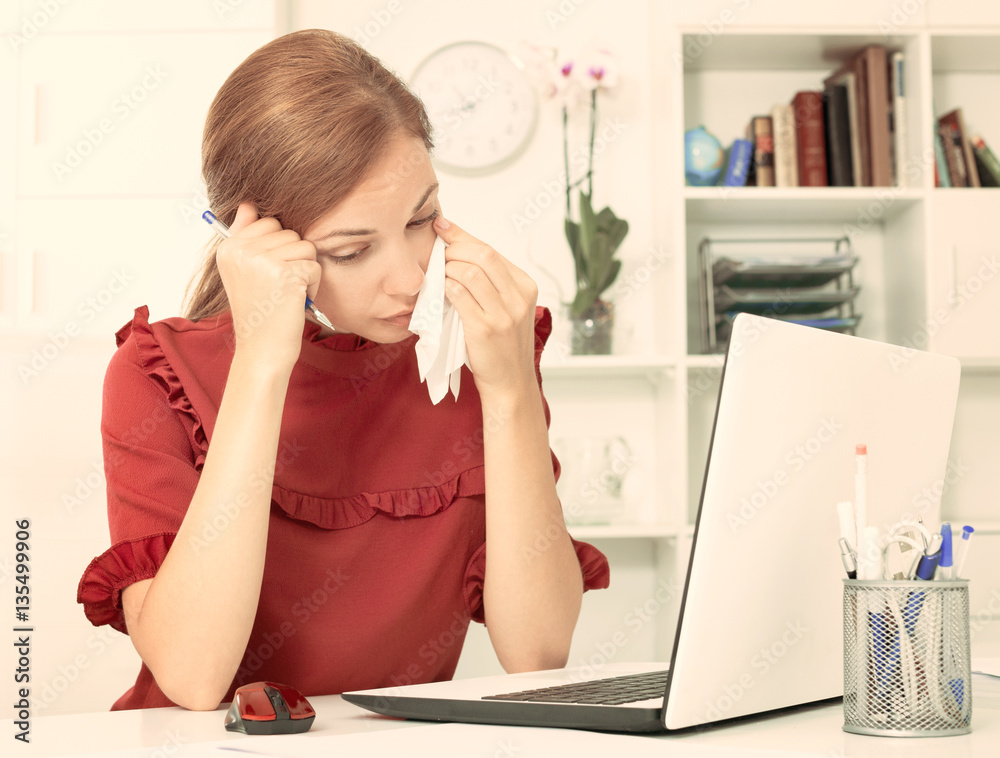 Sad woman crying in office Stock Photo | Adobe Stock