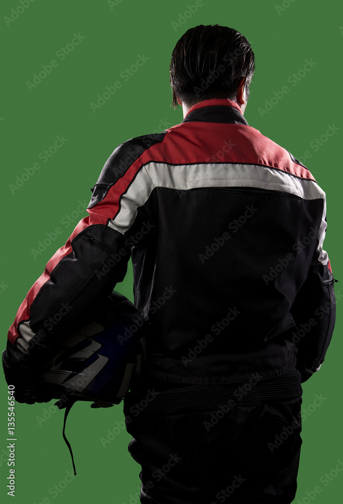 Male wearing protective leather and textile suit for racing race cars ...