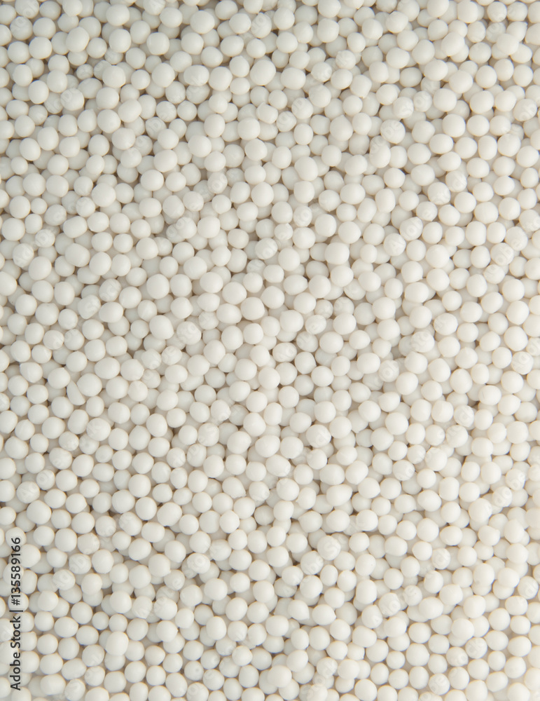 background of small plastic pellets white colored Stock Photo | Adobe Stock