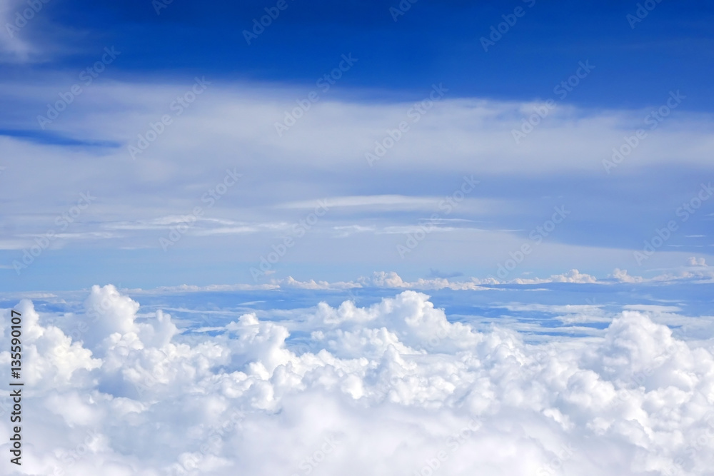 Above the clouds in the sky. View from above the clouds. Flying over ...