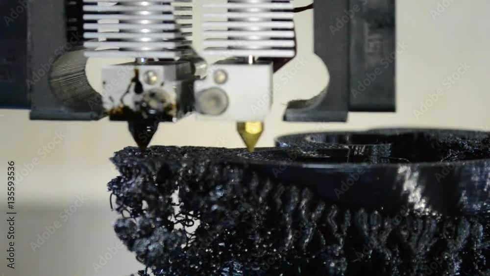 3d printer create black detail close-up. Progressive modern additive ...