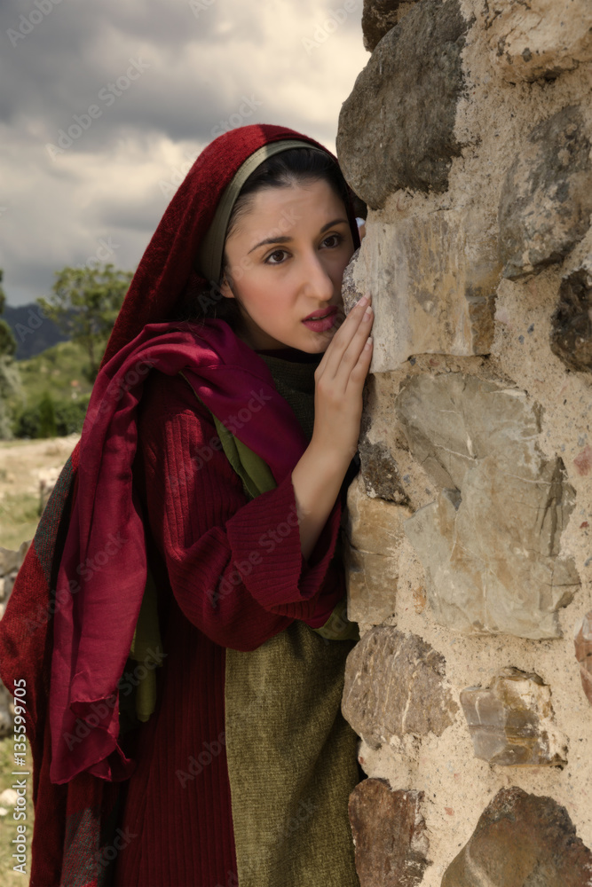 Mary Magdalene crying at Jesus empty tomb Stock Photo | Adobe Stock