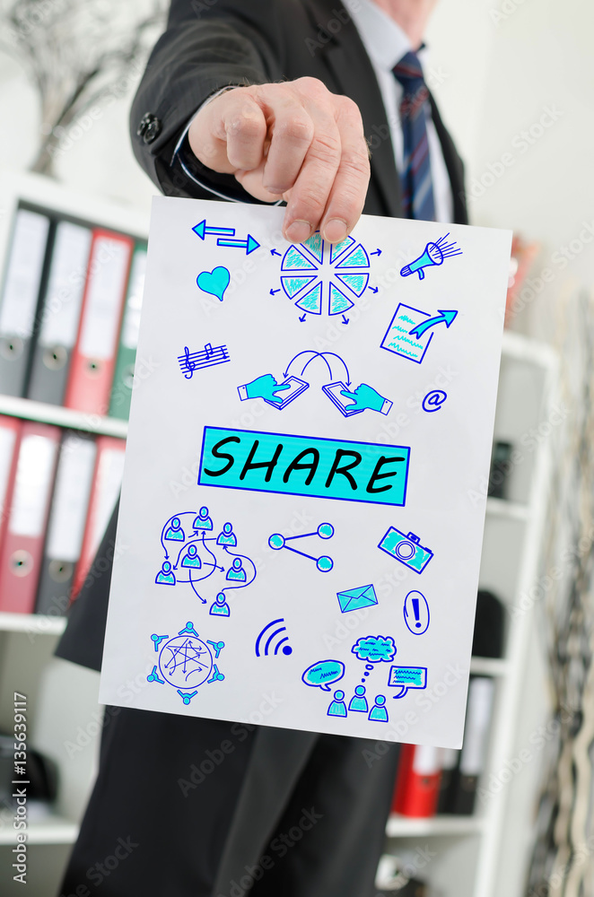 Share concept shown by a businessman foto de Stock | Adobe Stock