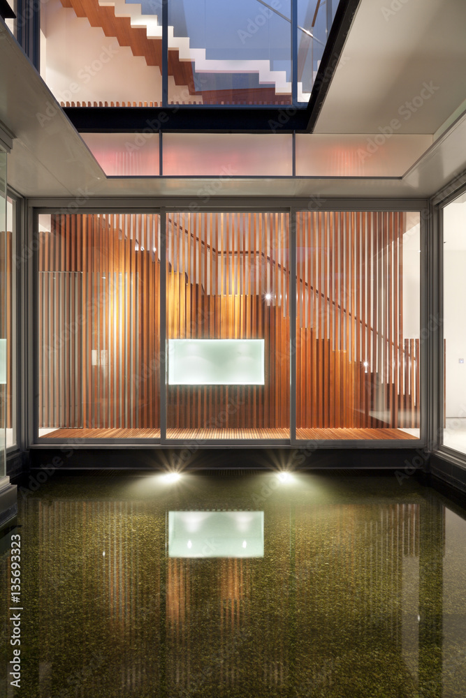 Lit internal water feature in residential house Stock Photo | Adobe Stock