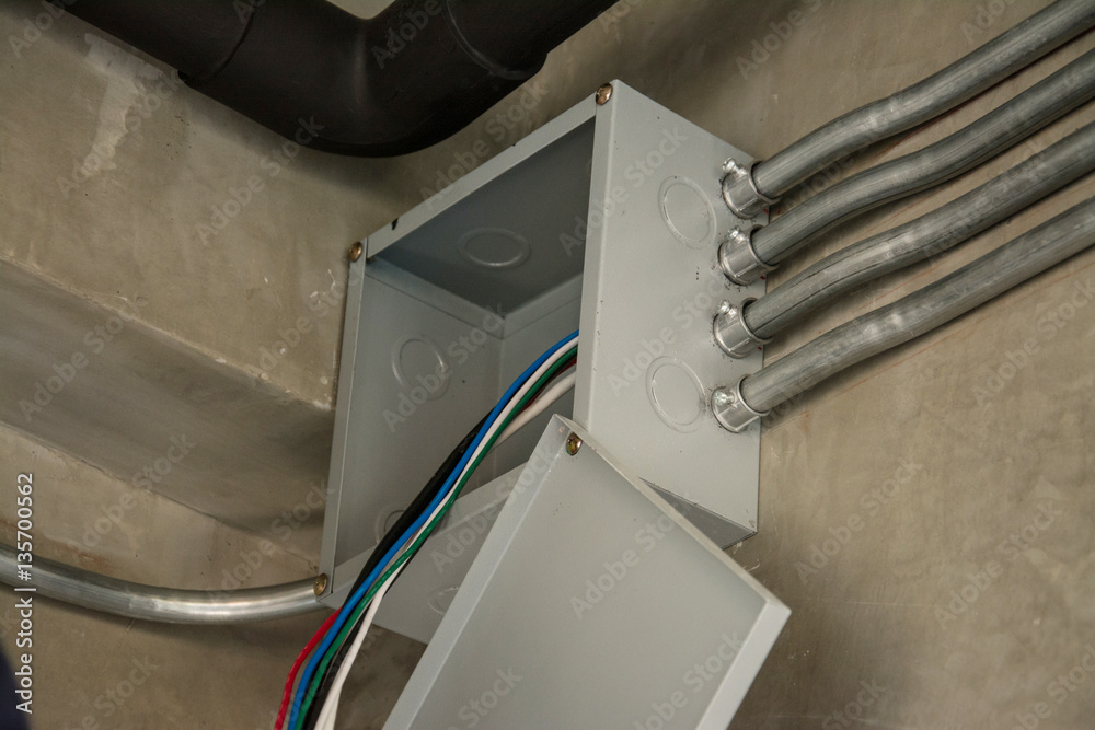 electrical cable in galvanized conduit pipe connection Stock Photo ...