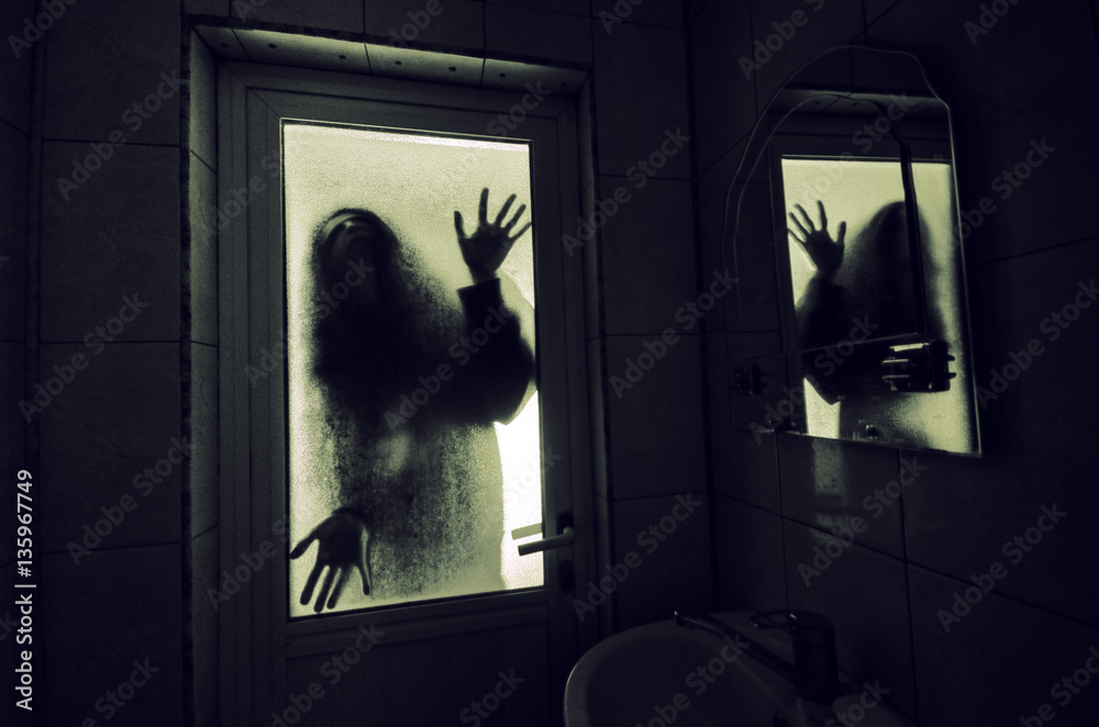 Horror woman in window wood hand hold cage scary scene halloween ...