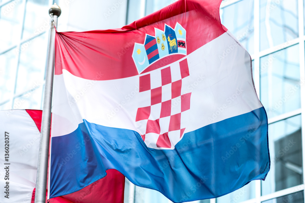 Flag of Croatia waving. It consists of three equal size, horizontal ...
