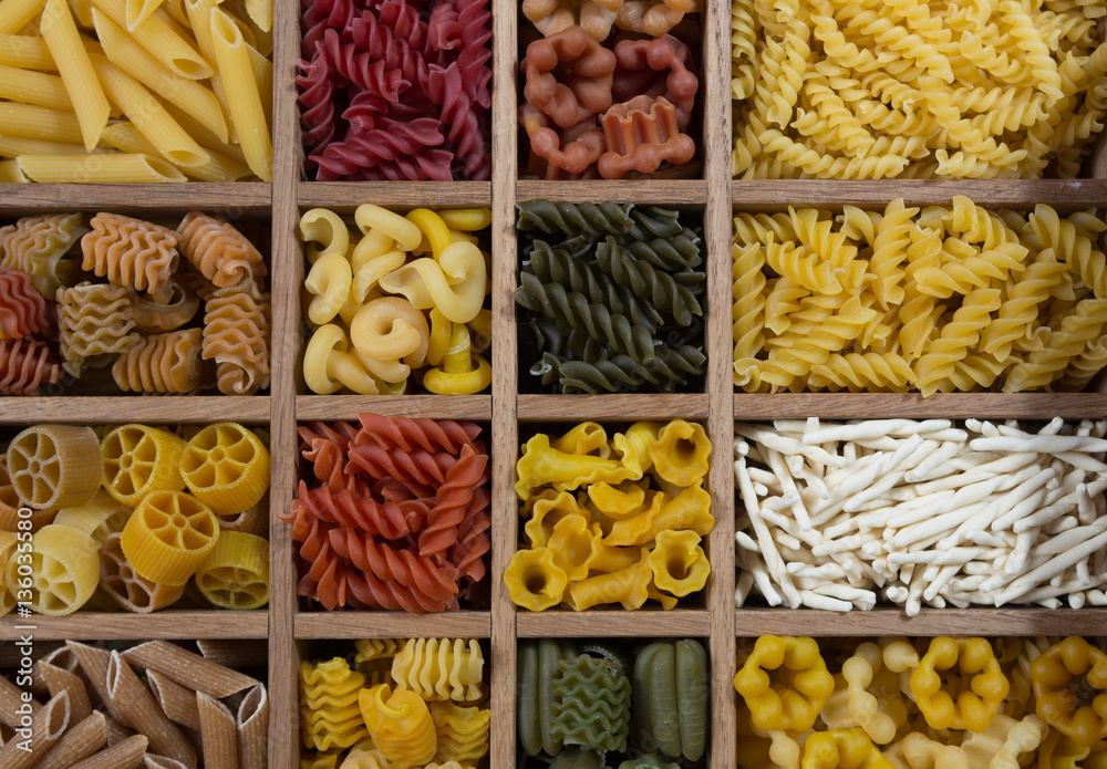 Variety of types, colors and shapes of Italian pasta. Dry pasta Stock ...